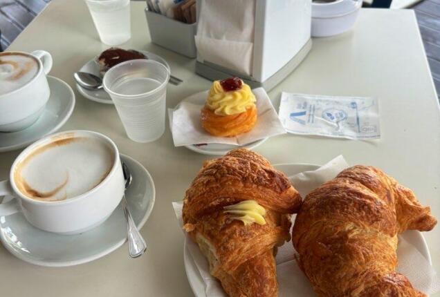 Cappuccinos & custard pastries are served best with a side of breaking ...